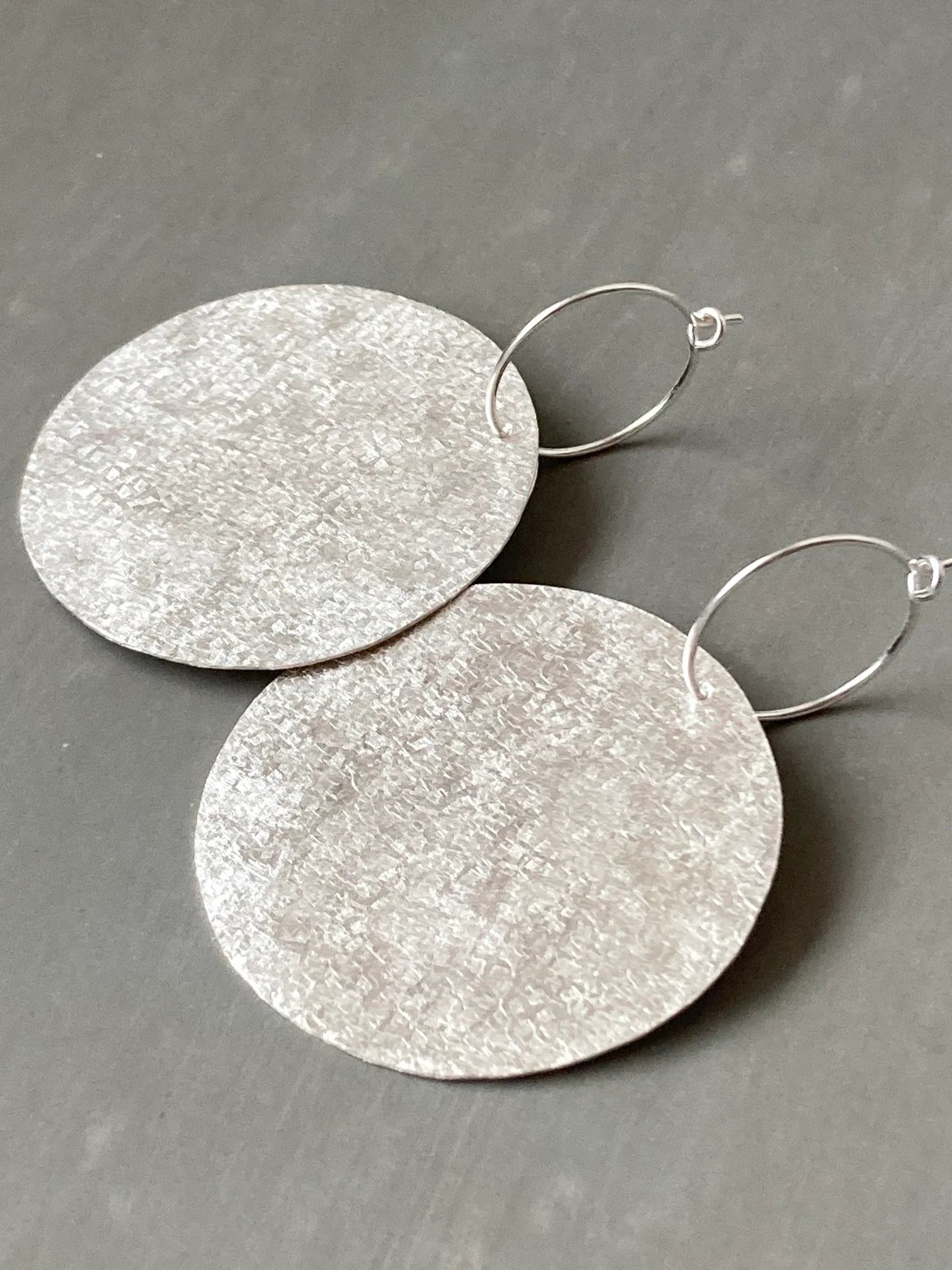 Large sterling silver textured disc hoop earrings. – Kaila jewellery
